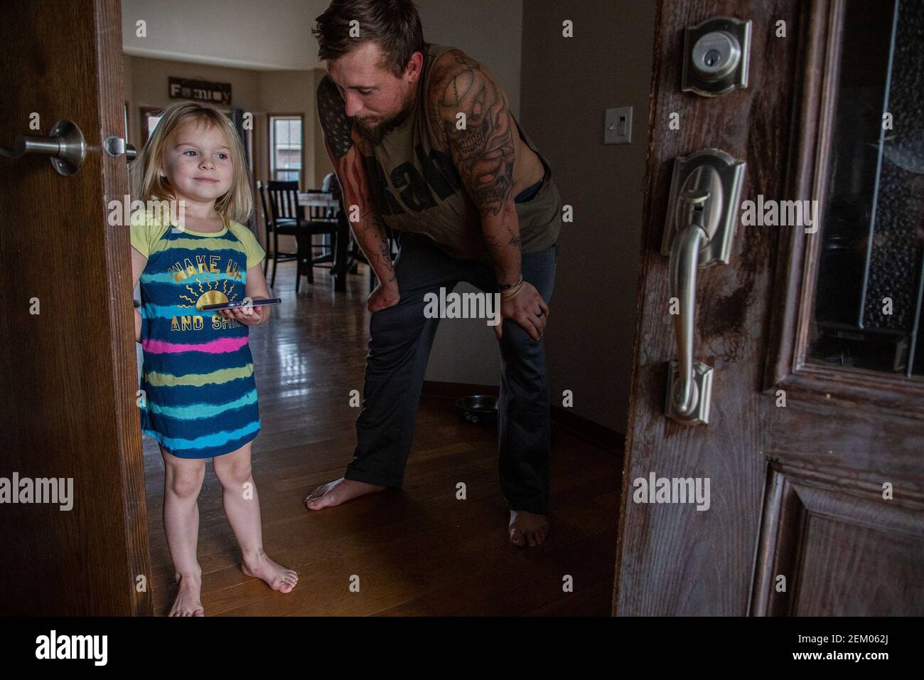 Adam Seidler with daughter, Paisley, 4, at home in Diamond, Nov. 11 ...