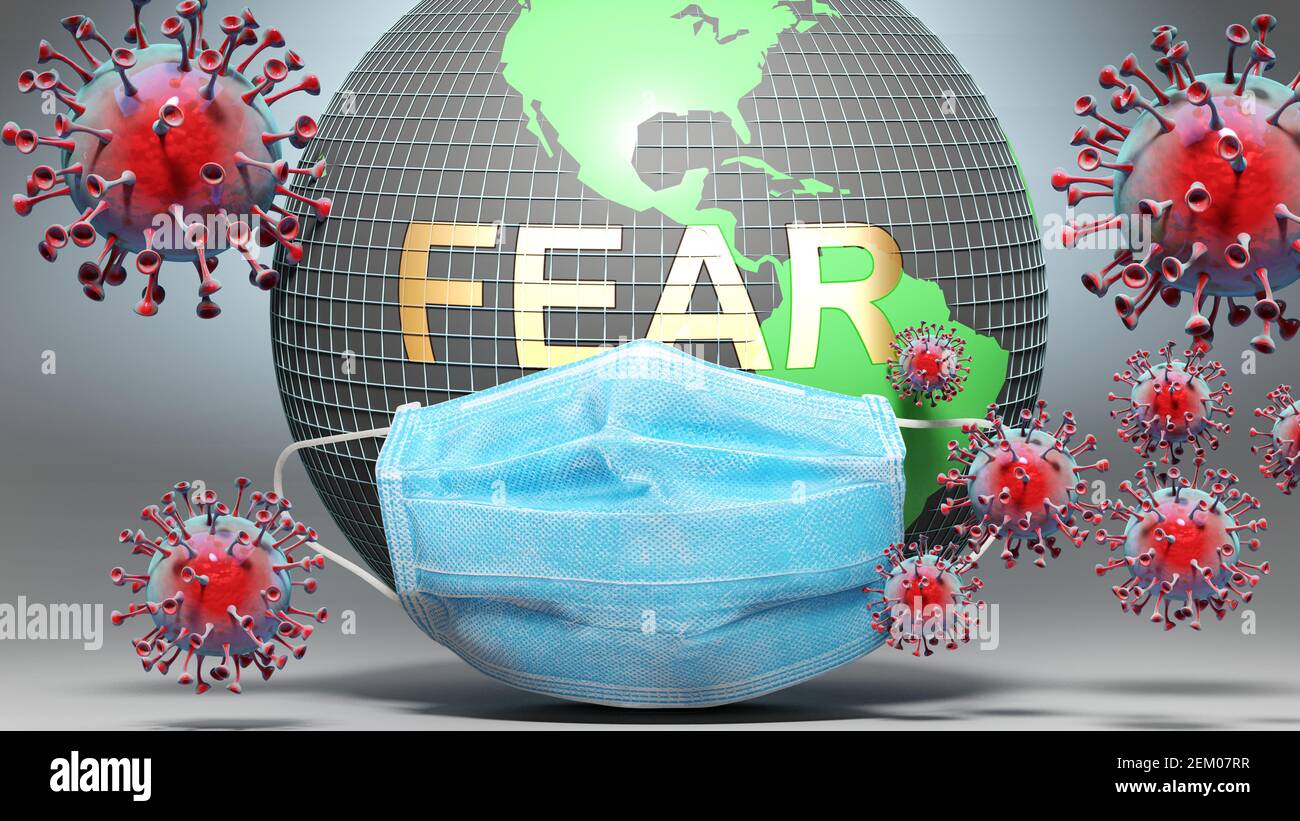 Fear and covid - Earth globe protected with a blue mask against ...