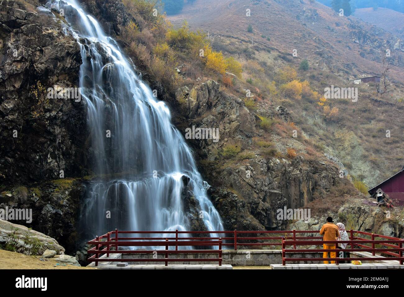 Visitors explore the waterfalls on an autumn day in Drang about 40kms ...