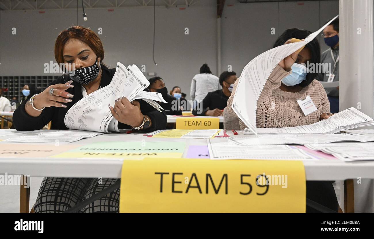 Election workers in Gwinnett County, Georgia began working through a ...