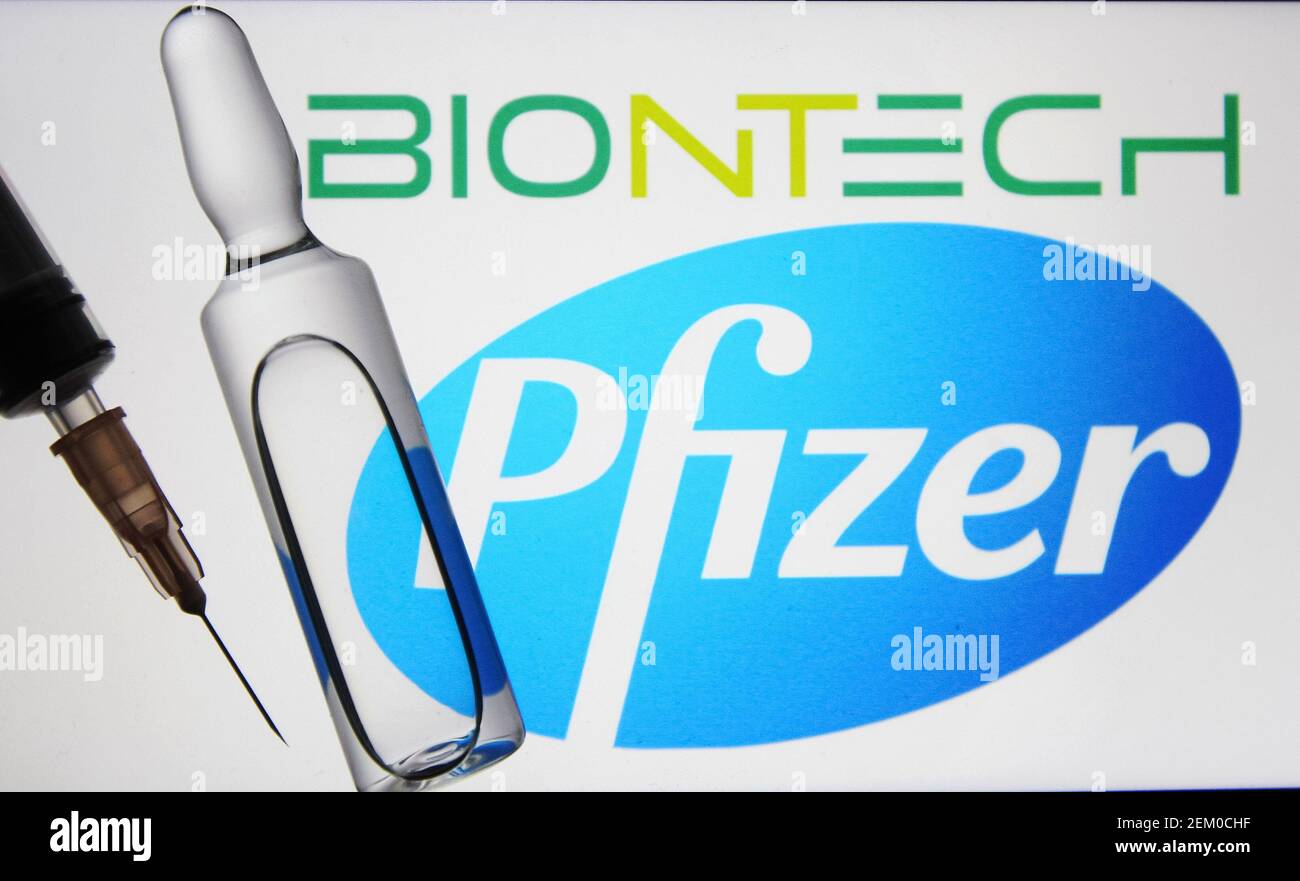 In this photo illustration a syringe and an ampule seen in front of ...