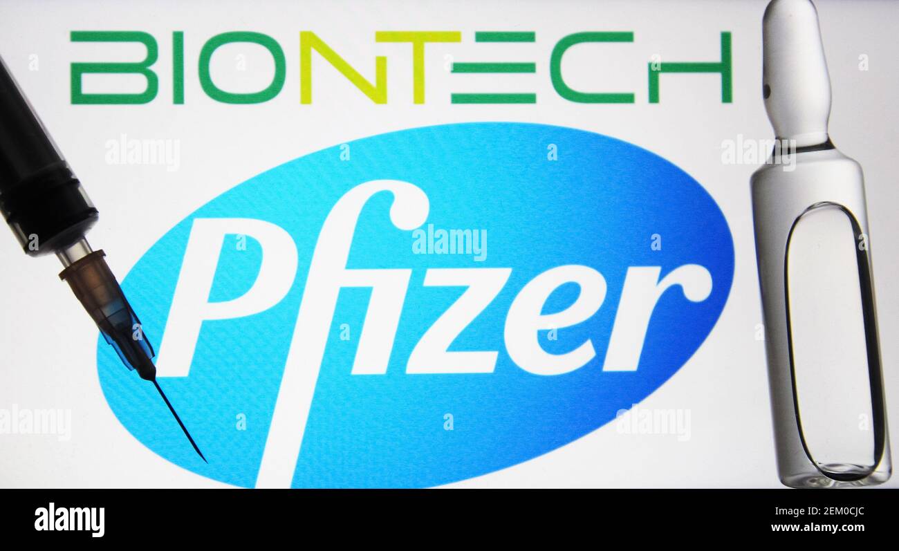 In this photo illustration a syringe and an ampule seen in front of ...