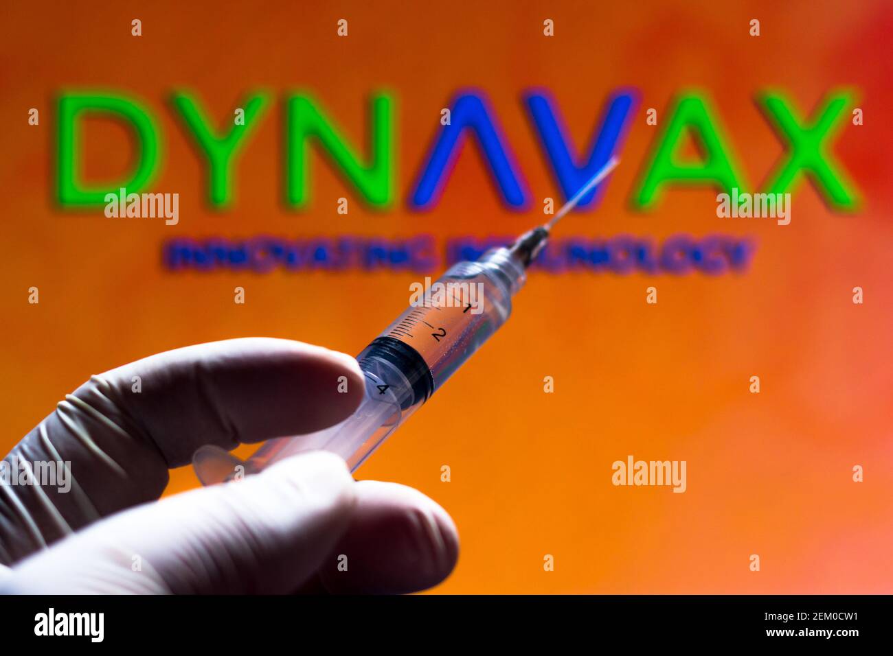 In this photo illustration a medical syringe is seen with Dynavax ...