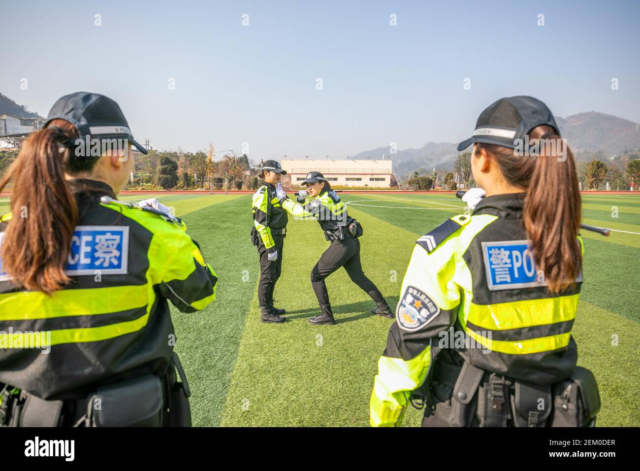 Female traffic police members under the guidance of instructors held ...