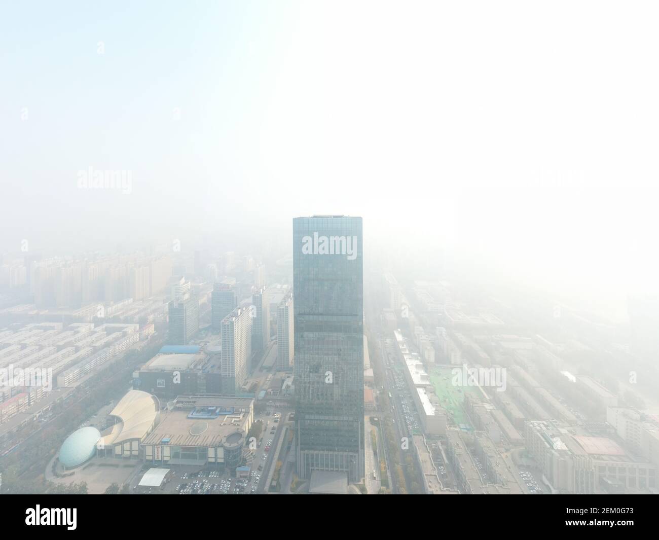 --FILE--An aerial view of buildings at downtown area covered by severe ...