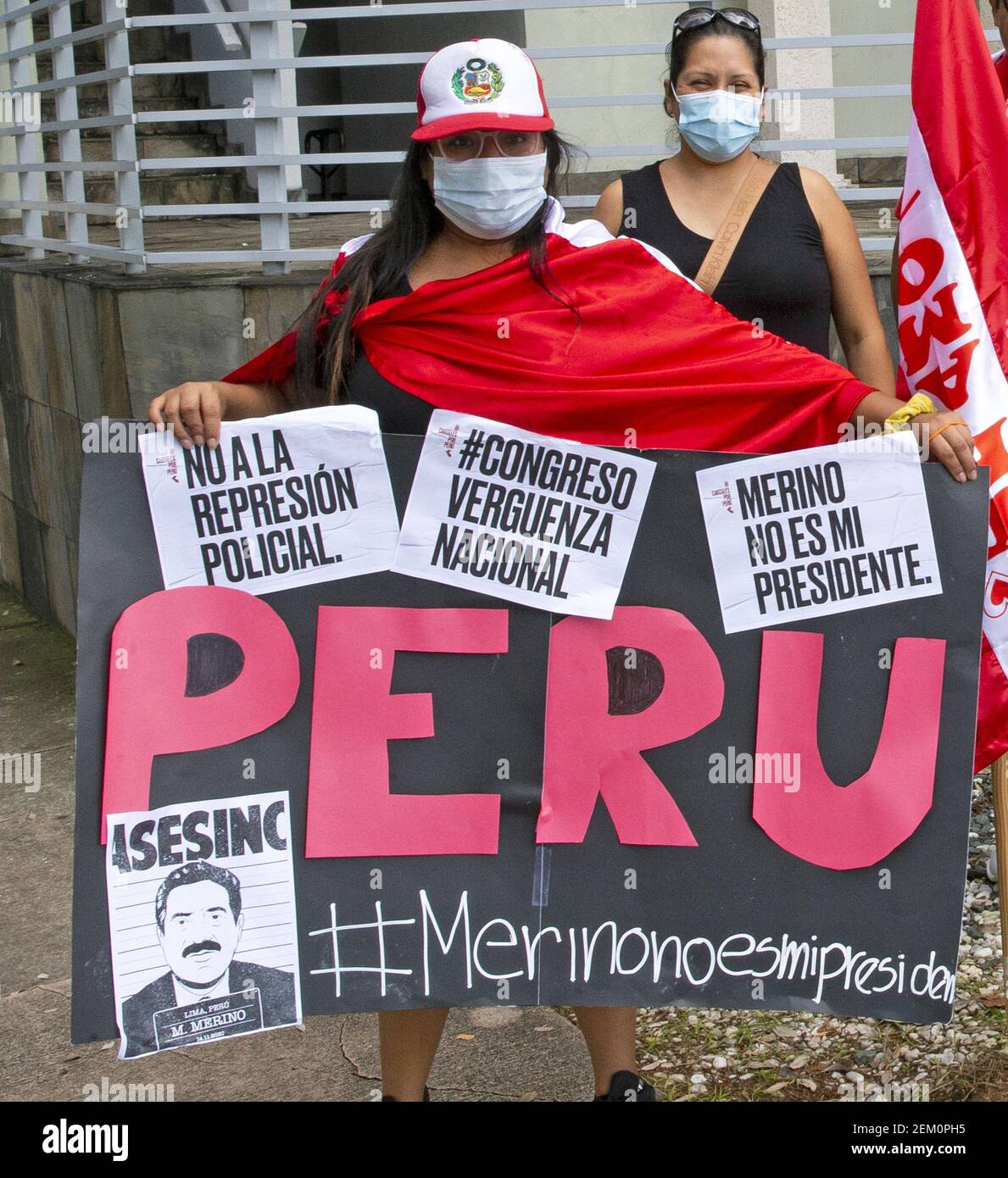 Peruvian resident in South Florida Dora Murga demonstrates in front of ...