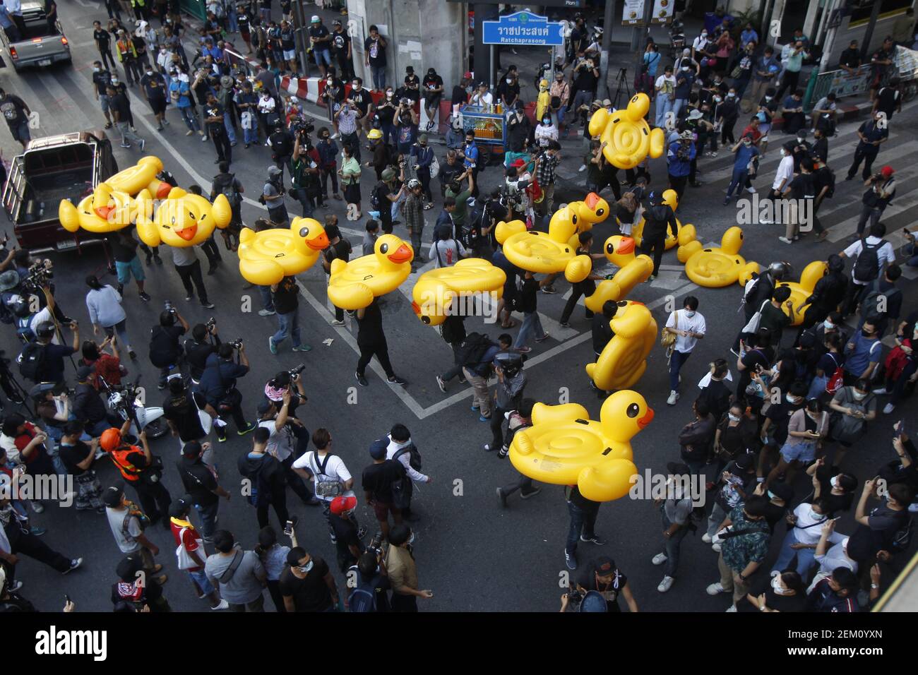 Pro-Democracy protesters carry oversized yellow rubber ducks during the ...