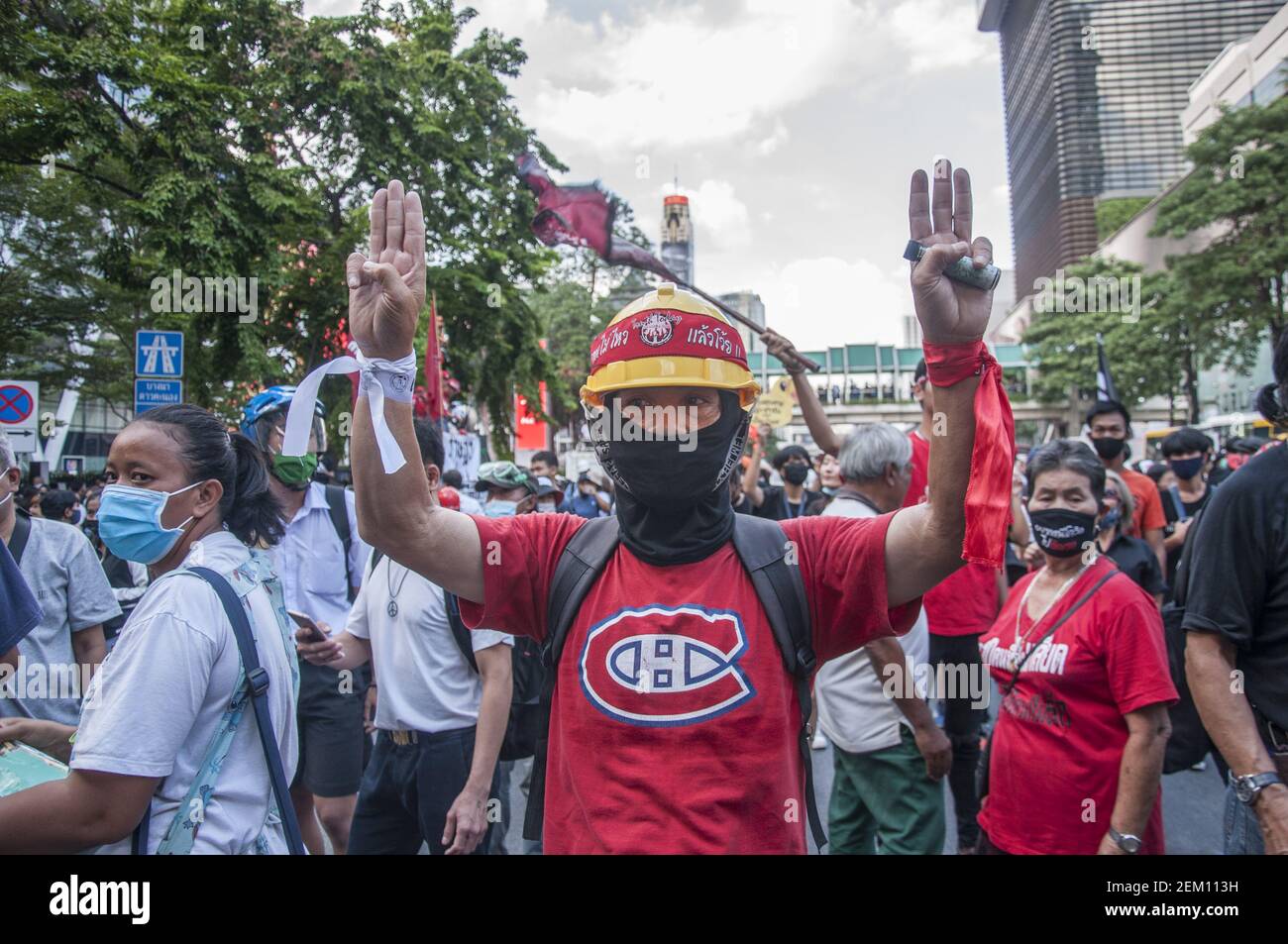 A protester making the three finger salute during the demonstration ...