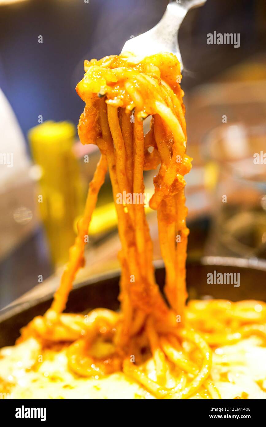 A tempting spaghetti with meat sauce, fork the pasta Stock Photo - Alamy