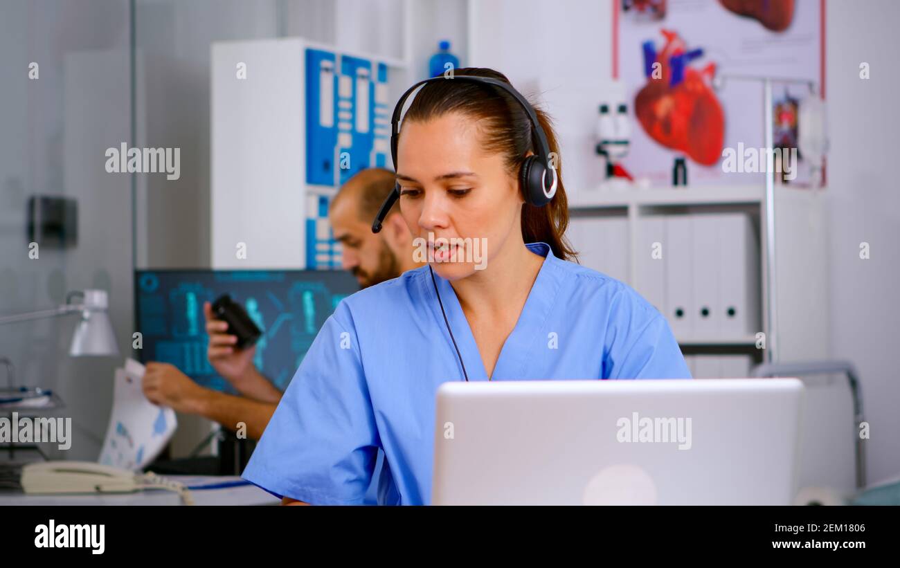 Secretary checking in hospital hi-res stock photography and images - Alamy