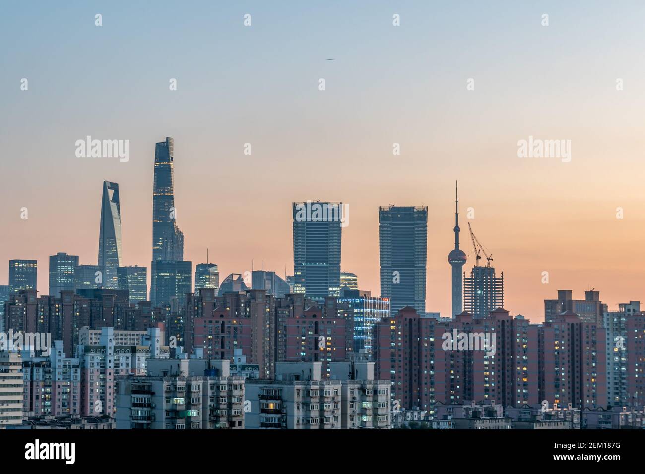 Skyscrapers at the Lujiazui New Area and the Bund stand steadily with ...