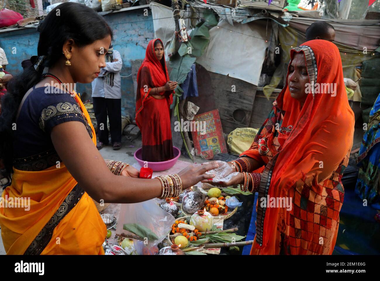 Hindu devotees offer their prayers to the God "Sun" on the auspicious ...