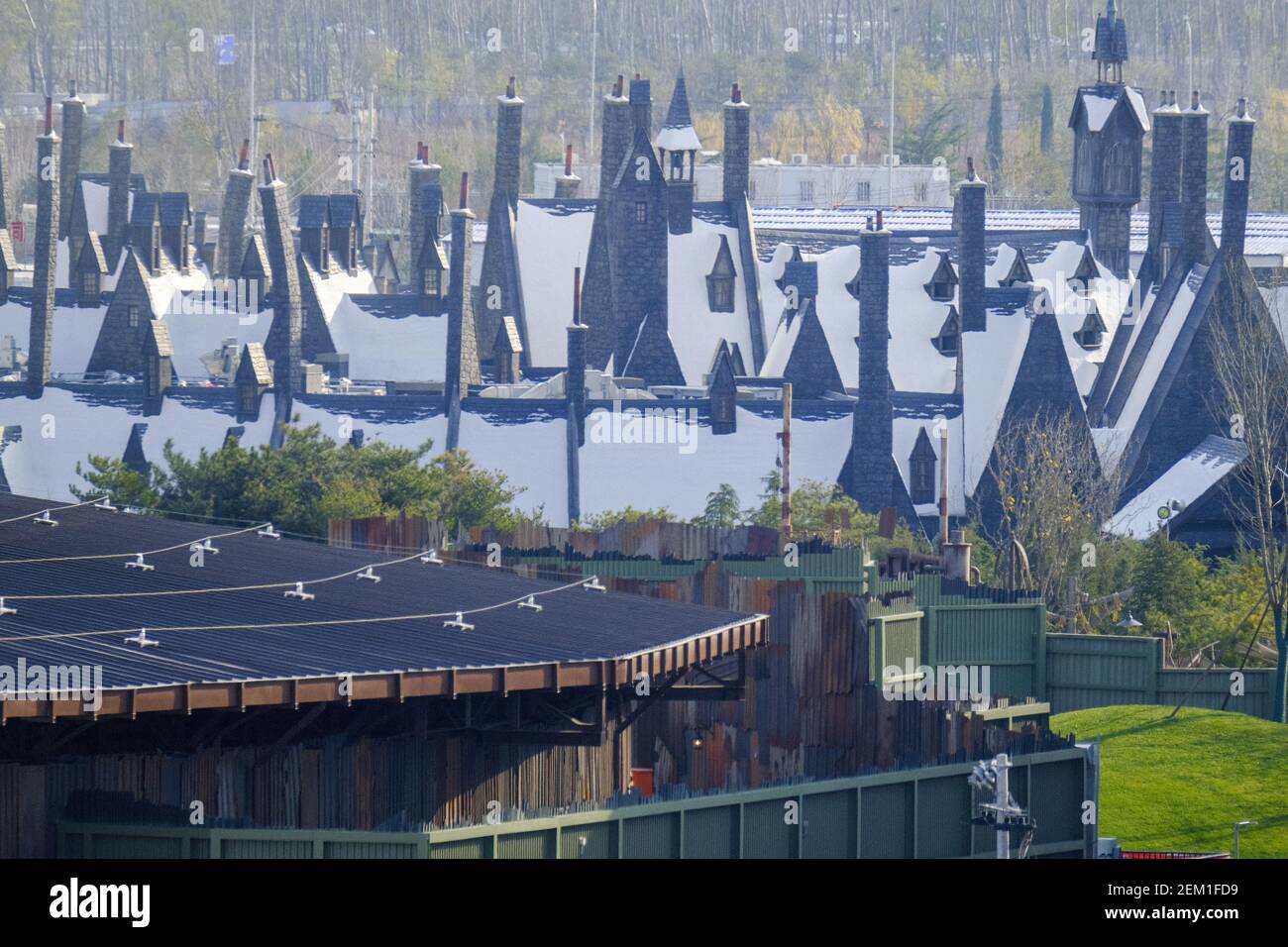 An aerial view of the buildings including a Hogwartz-like castle under ...