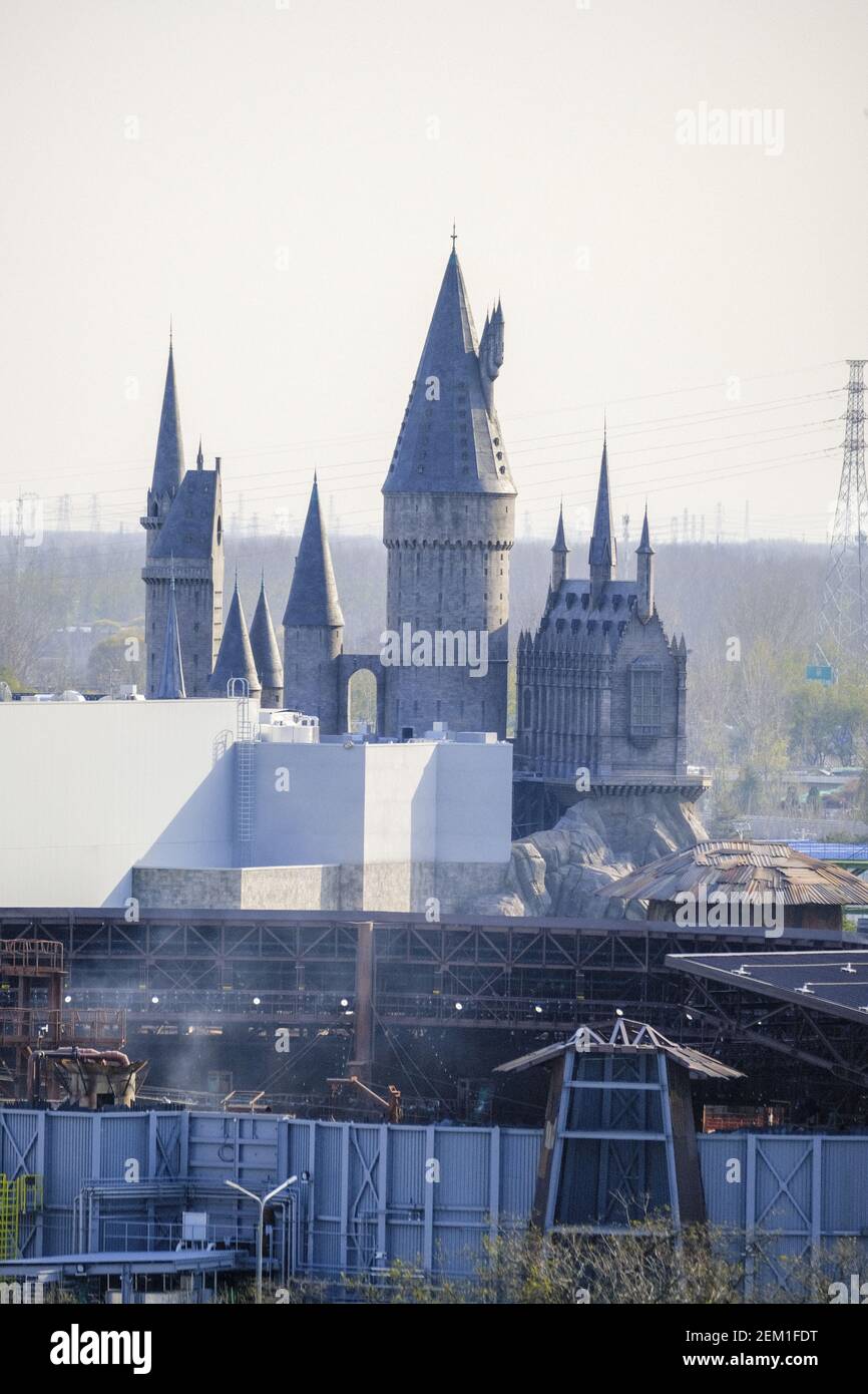 An aerial view of the buildings including a Hogwartz-like castle under ...