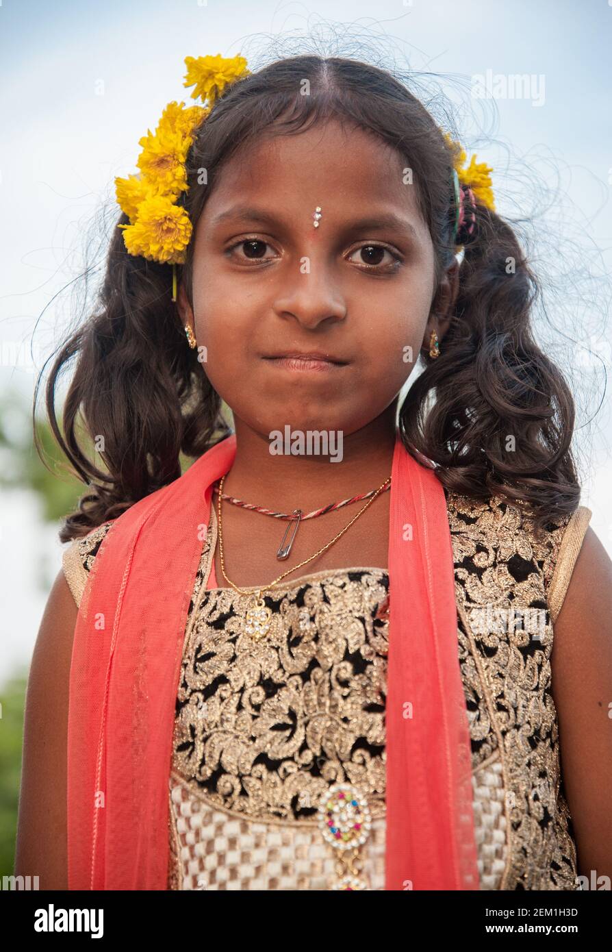 Nellore, Andhra Pradesh, India: Girl with flowers in hair, daughter of ...