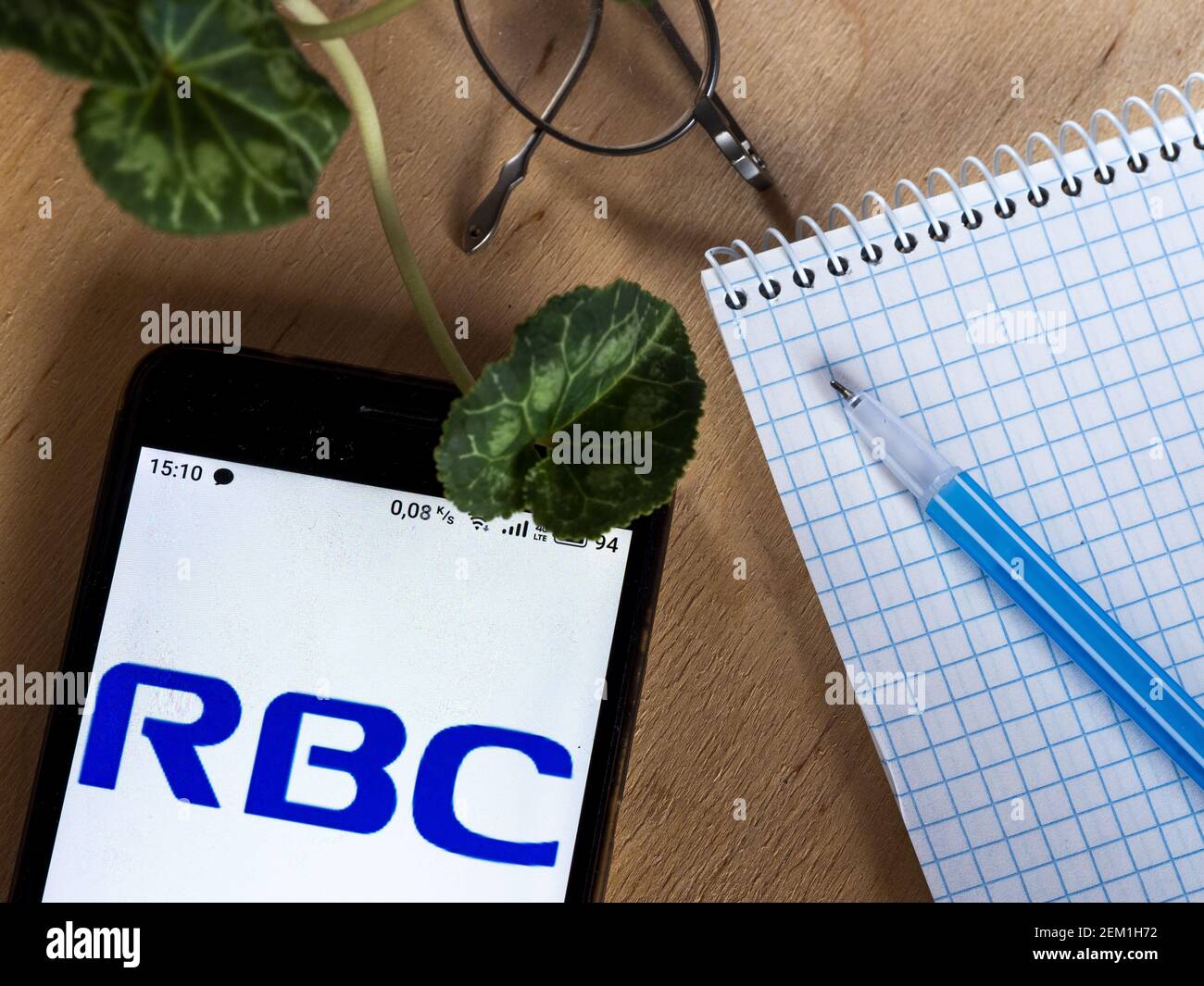 In this photo illustration the RBC logo is seen displayed on a ...