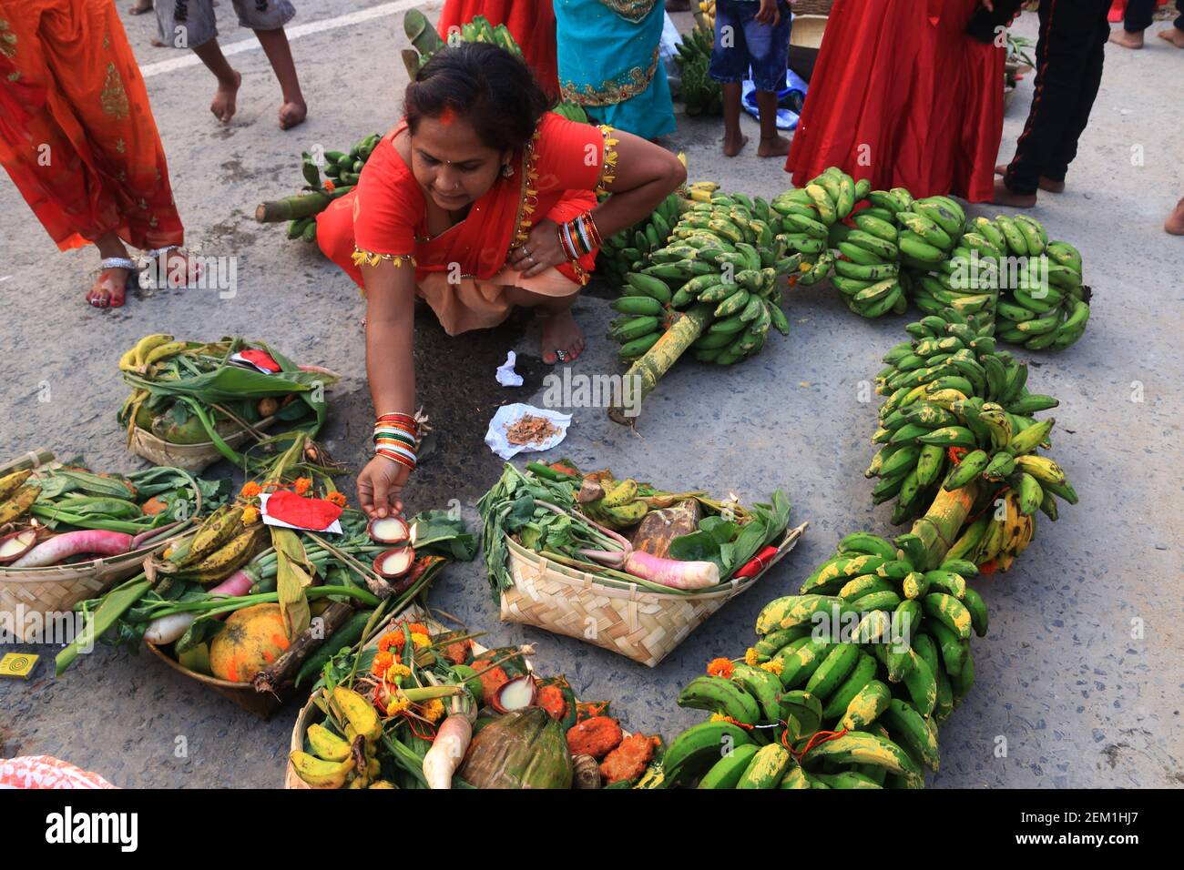 Hindu devotees worship the Sun god on the banks of the Ganges River ...