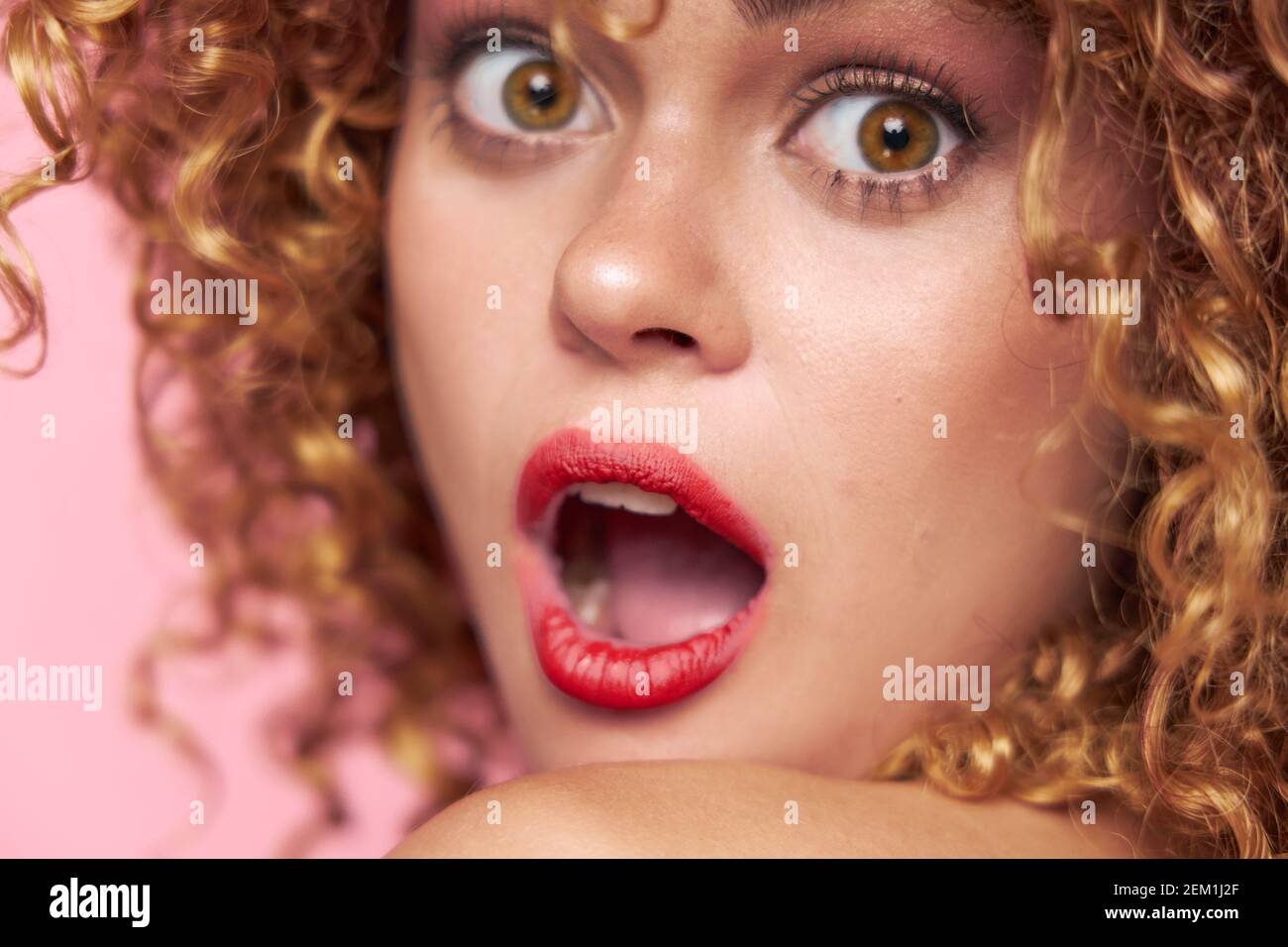Charming Makeup red lips surprise model sequin shirt Stock Photo - Alamy