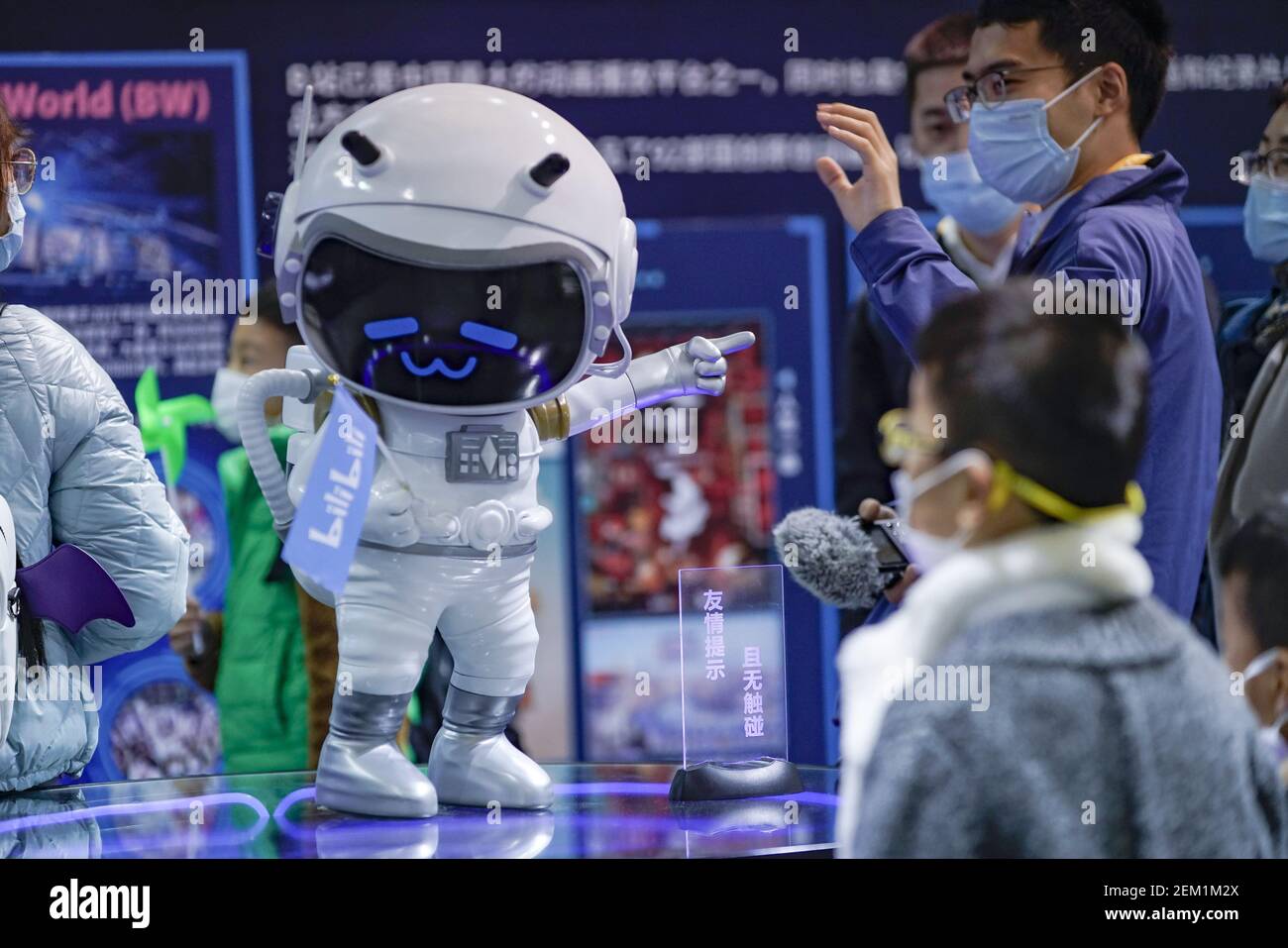 People take photos of a Baidu Robot, nicknamed "Xiao Du" at the 2020 ...
