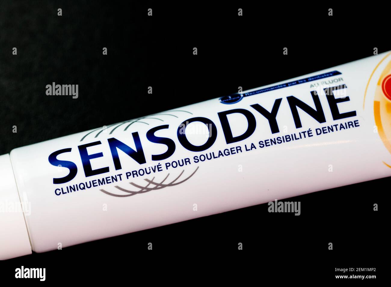 Sensodyne toothpaste tube on black background. Bucharest, Romania, 2021 ...