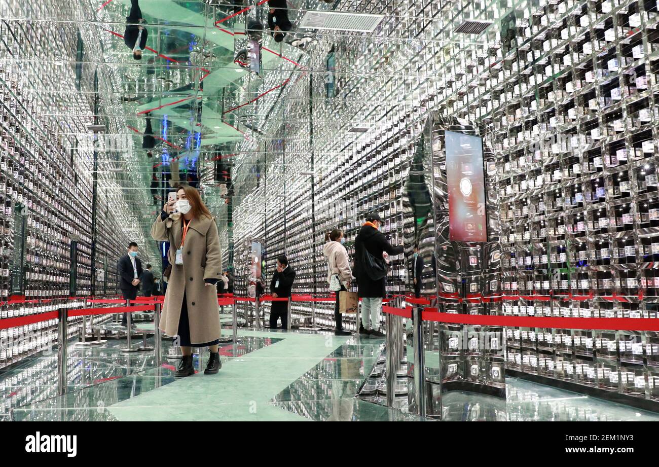 People observe the seeds preserved and presented at the "Seed Bank ...