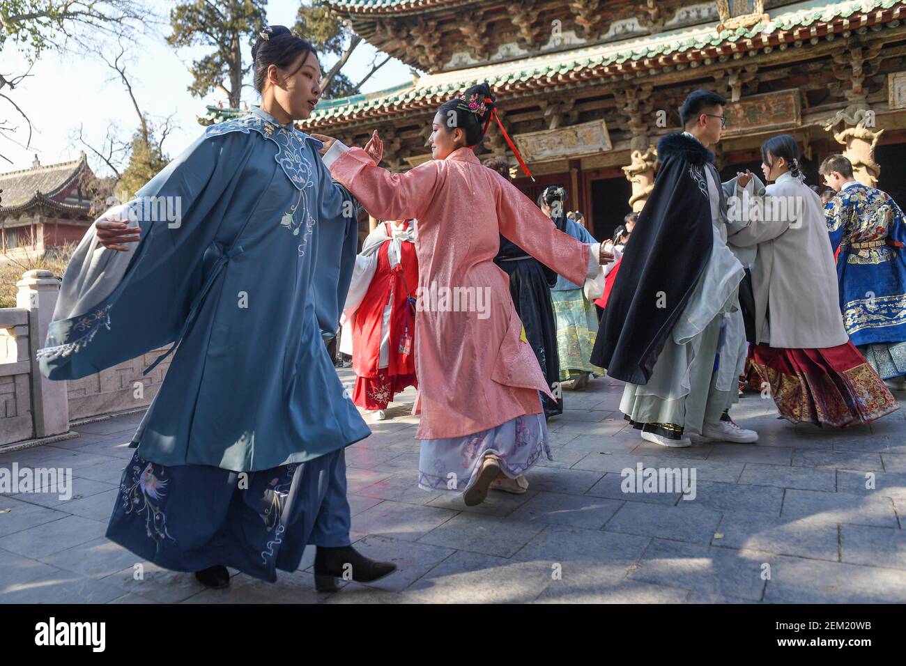 The traditional Han clothes lovers are dancing at the Han Dynasty ...