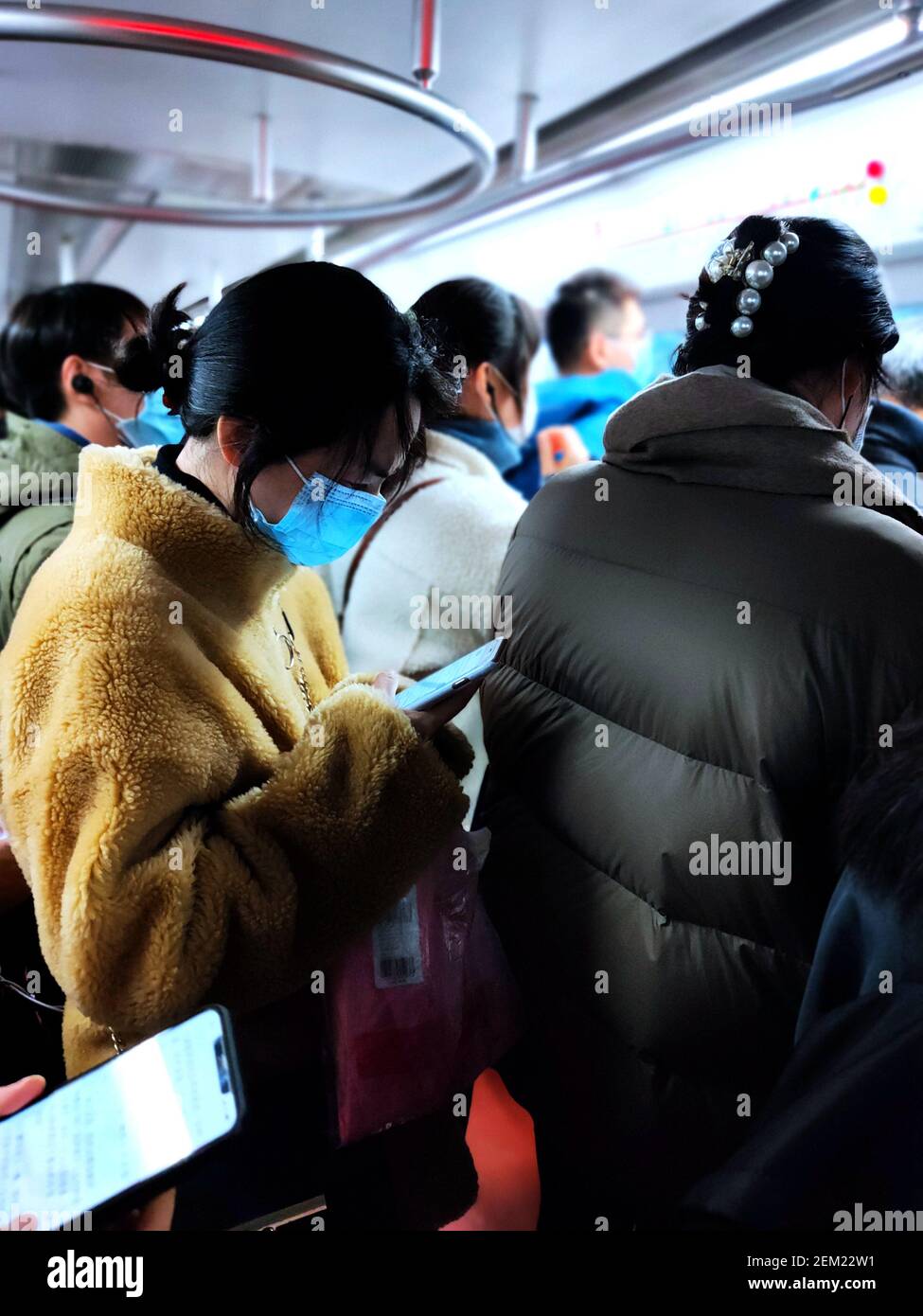 BEIJING, CHINA - NOVEMBER 24, 2020 - People crowded on the Batong line ...