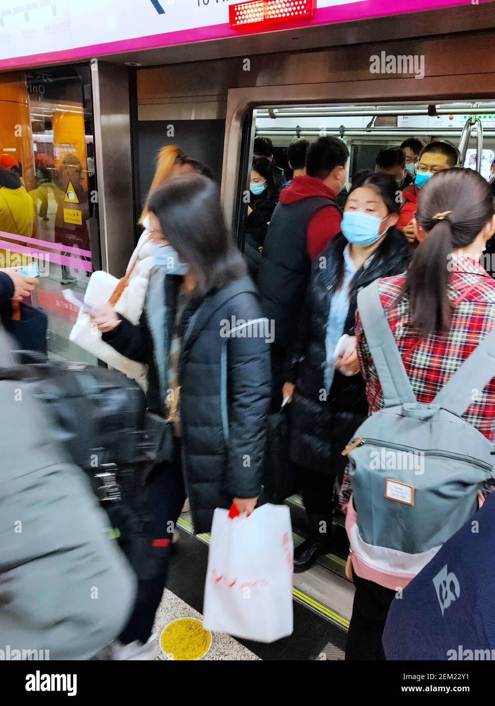 BEIJING, CHINA - NOVEMBER 24, 2020 - People crowded on the Batong line ...