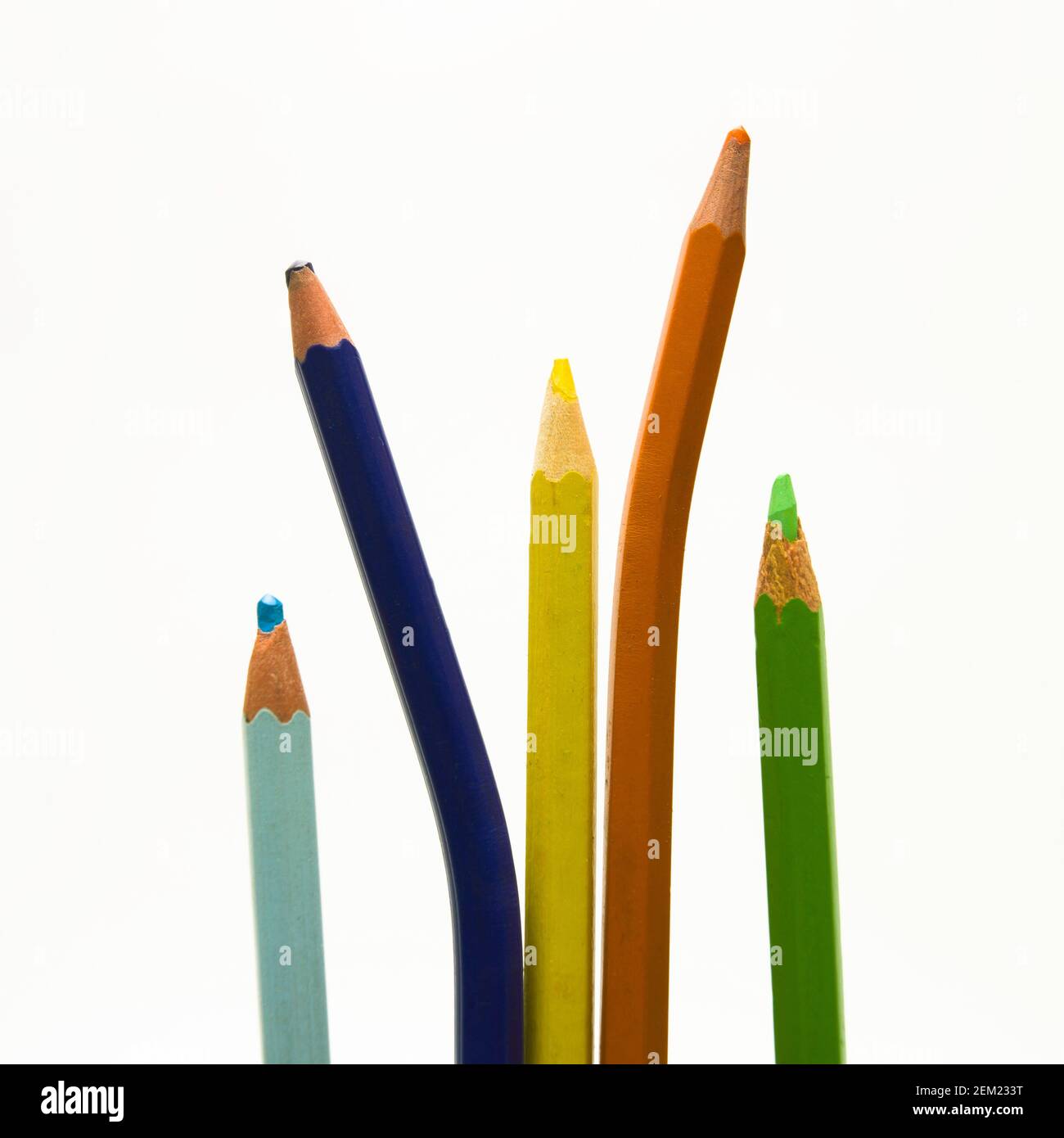 Colorful collection of pencils arranged in a playful manner against a ...