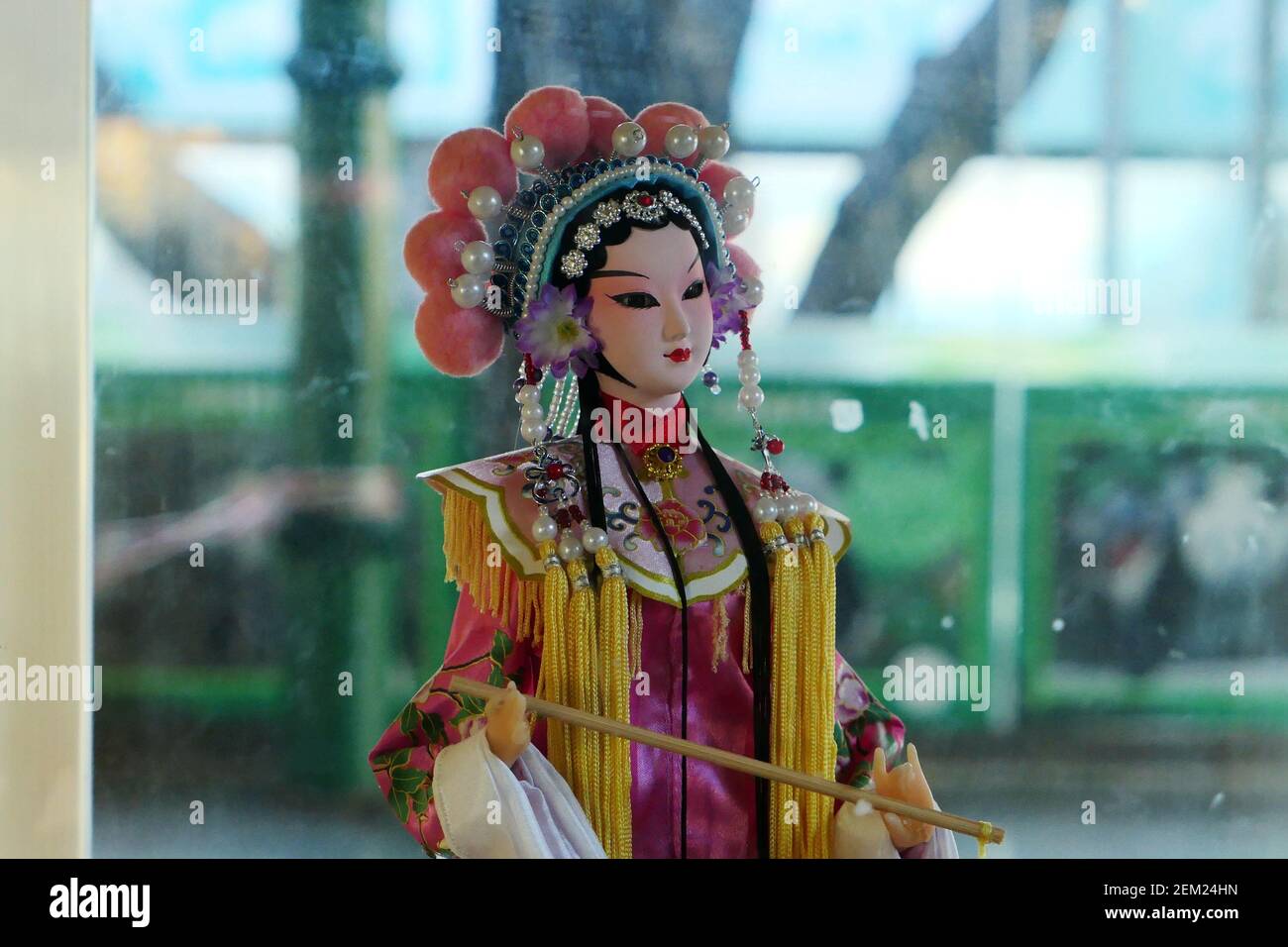 Beijing, CHINA-A silk man looks at a window in Shichahai Pedestrian ...
