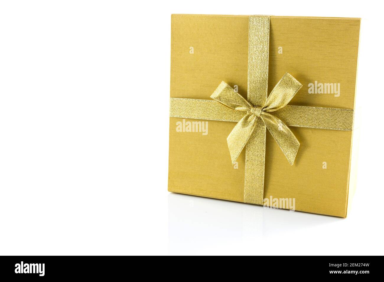 Luxurious gold gift box on white background Stock Photo - Alamy