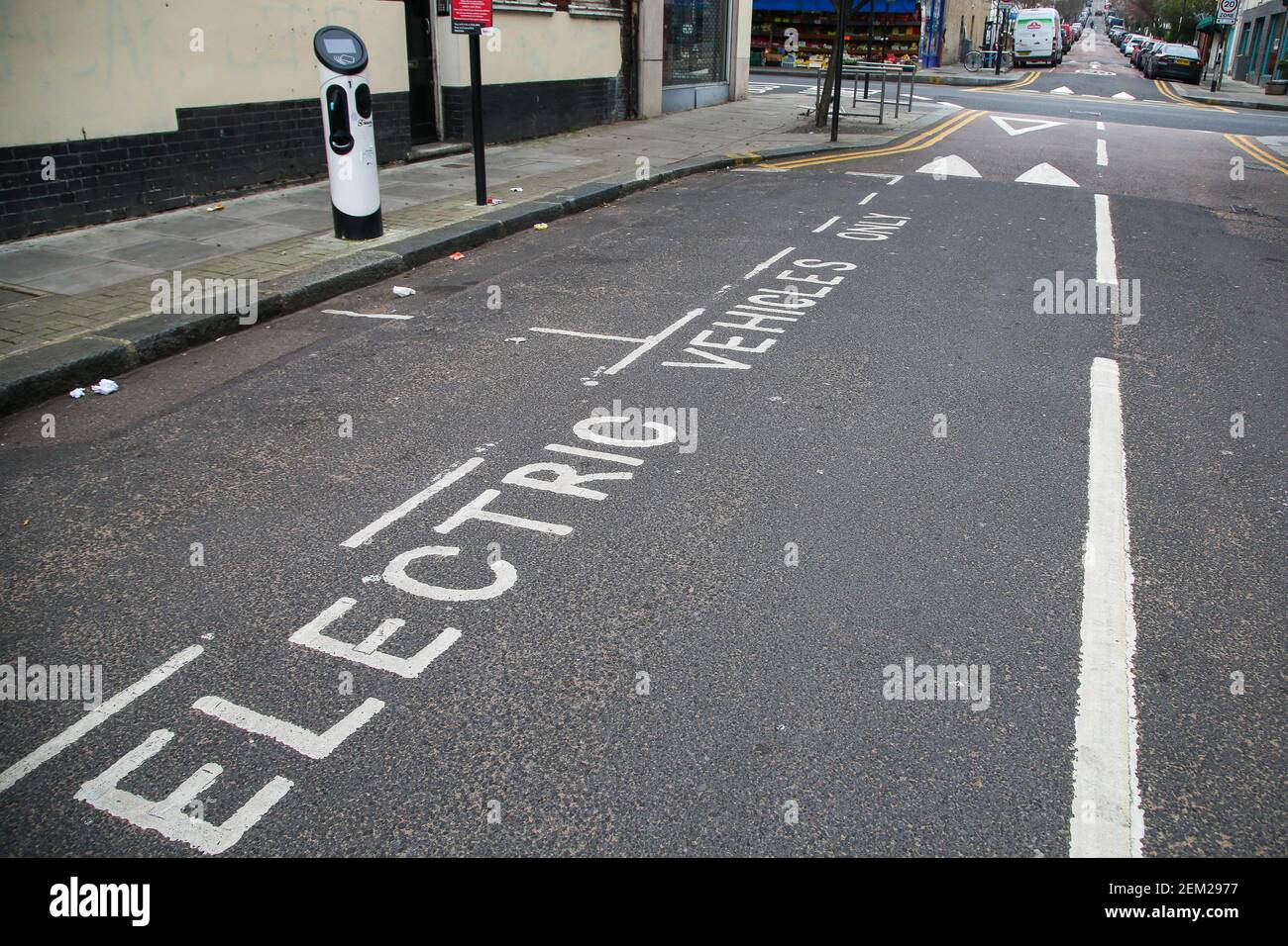 Road marking for electric vehicles seen next to the charging station in ...