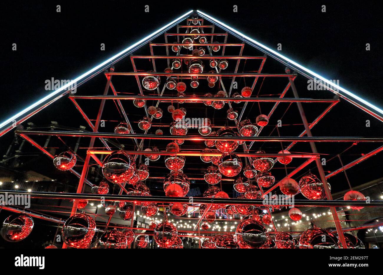 The Terrarium Tree lit at night in Coal Drops Yard. King's Cross ...