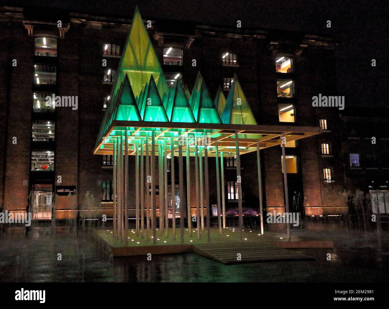 The Electric Nemeton Tree lit up at night. King's Cross, London's ...