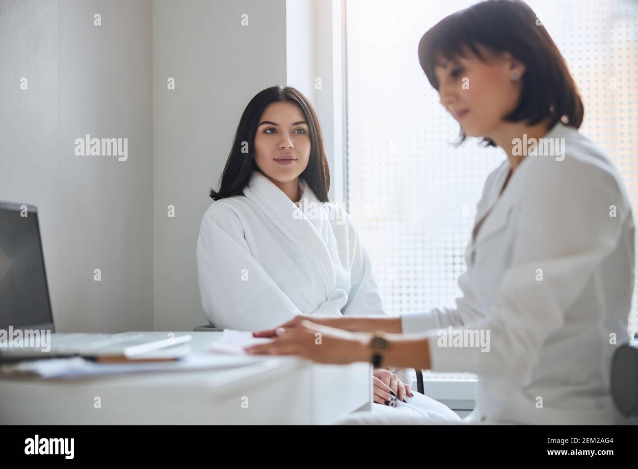 Doctor reading ecg hi-res stock photography and images - Alamy