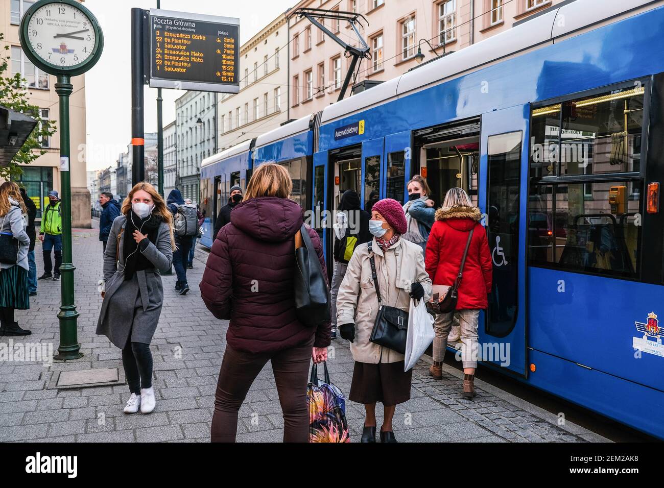 People wearing face masks as a precaution against the spread of covid ...
