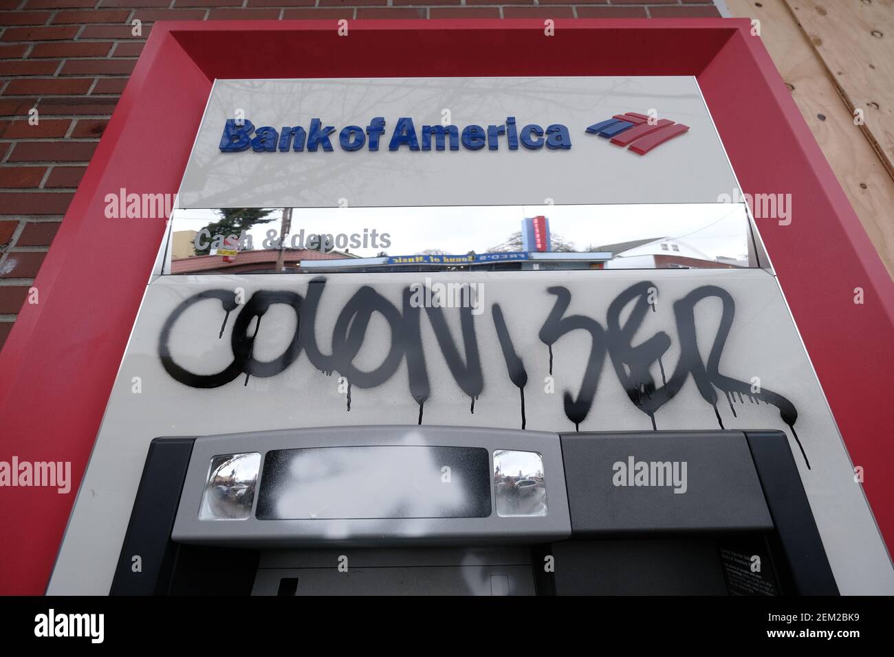 "Colonizer" Graffiti is pictured on a Bank of America ATM on Southeast ...