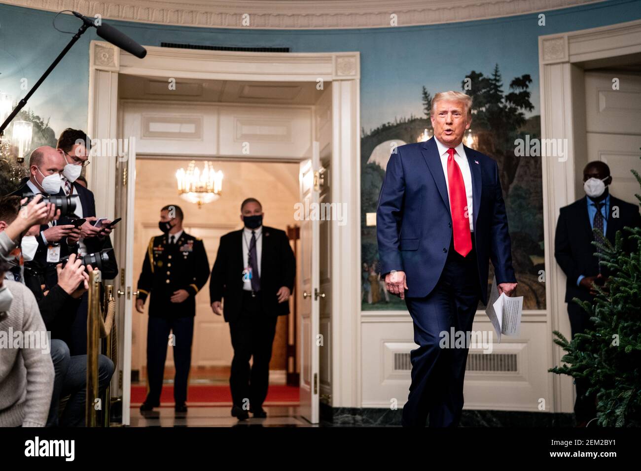 President Donald Trump speaks in the Diplomatic Room of the White House ...