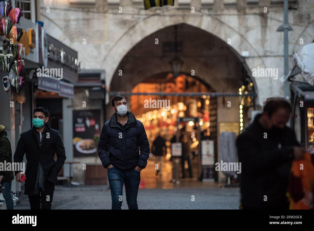 Turkish commuters wearing face masks as a precaution against the spread ...