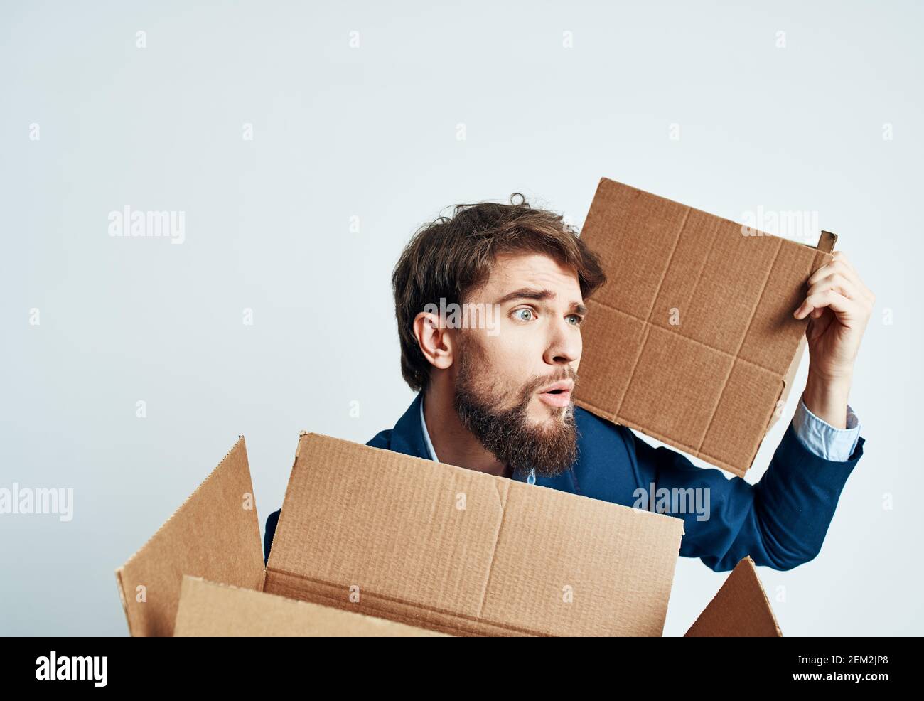 man with boxes in groups moving new place of work lifestyle official ...