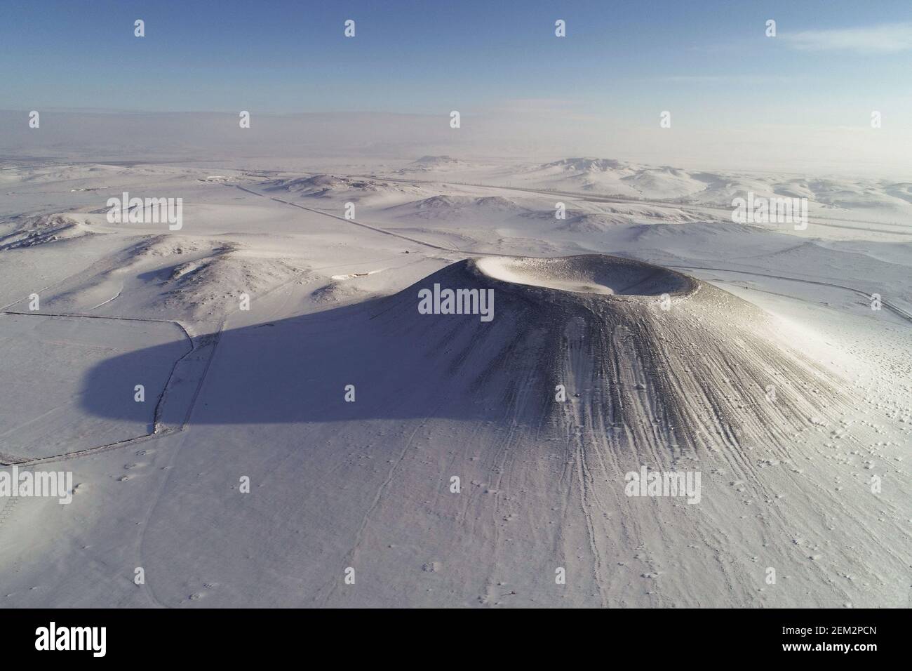 The fascinating scenery of Chahar Volcano Group covered in snow, which ...