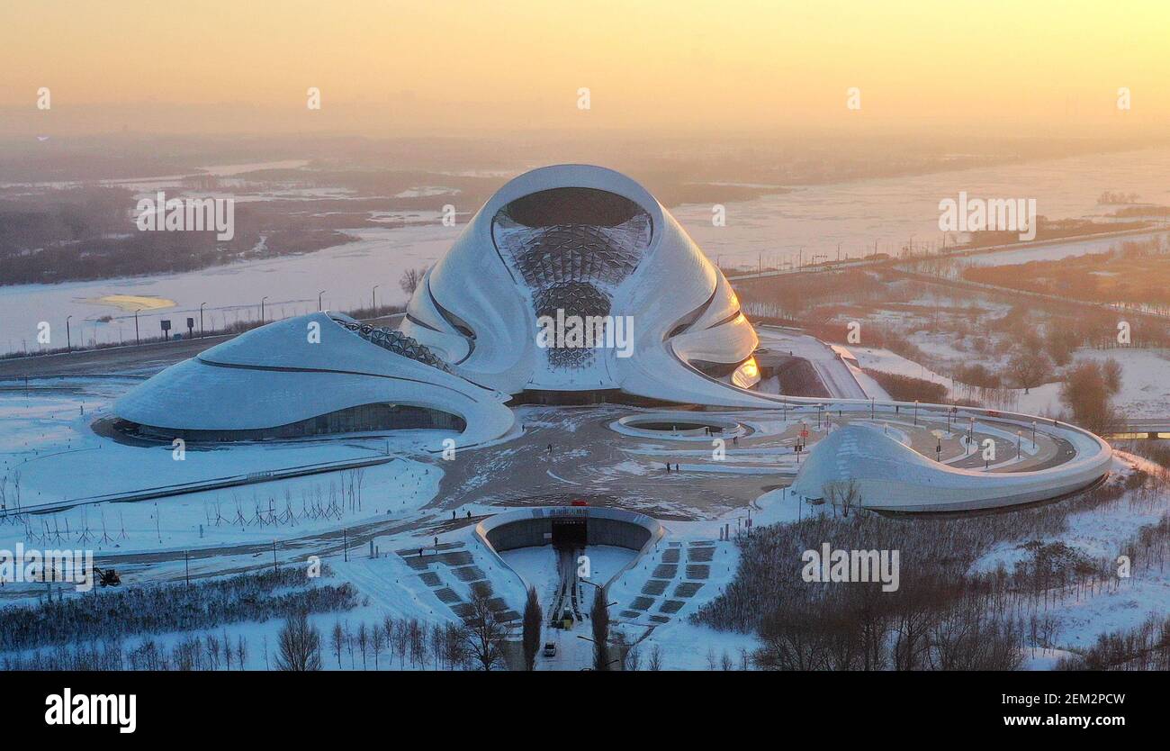 Aerial view of Harbin Opera House covered in snow, which is spectacular ...