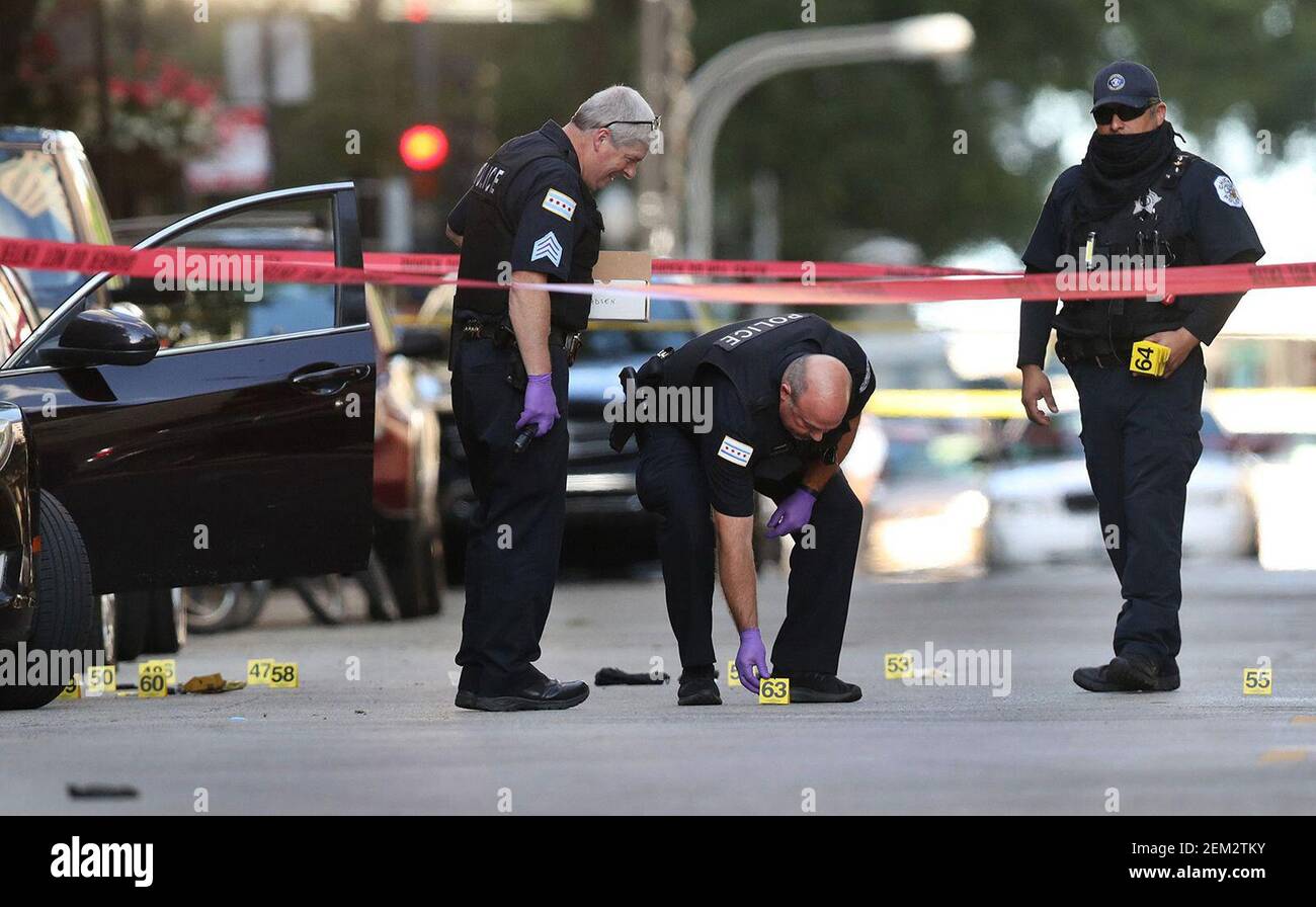 Chicago police investigate the scene of a shooting that killed rapper ...