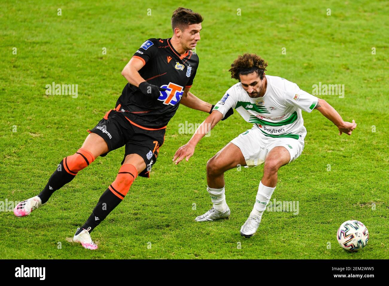 Jakub Moder of Lech (L) and Kenny Saief of Lechia (R) are seen in ...