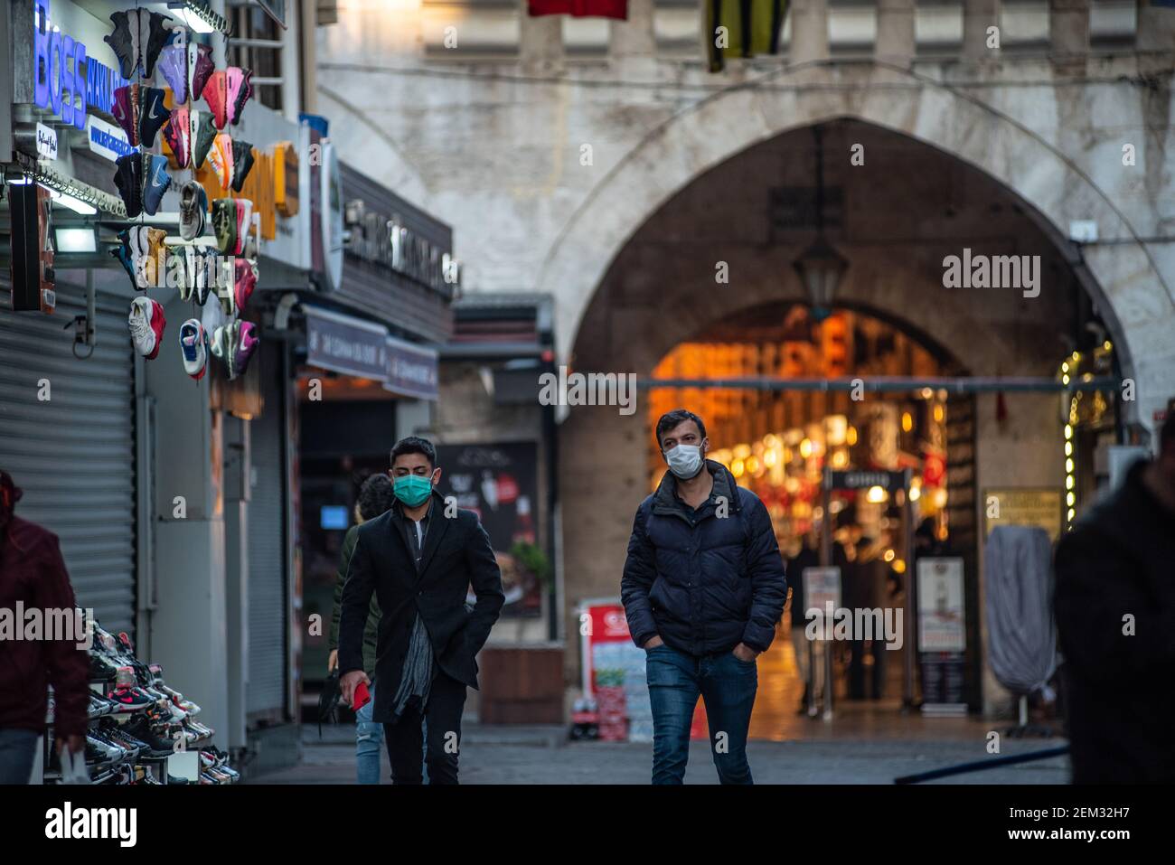 Turkish commuters in the Fatih district seen wearing face masks as ...