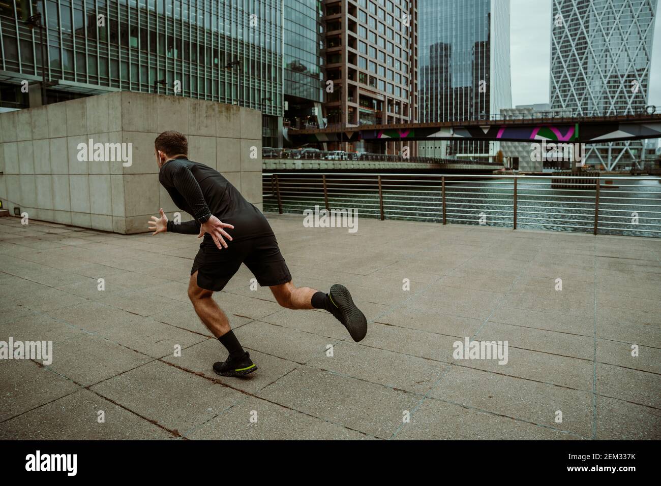 caucasian male athlete sprinting for excersise in city Stock Photo - Alamy