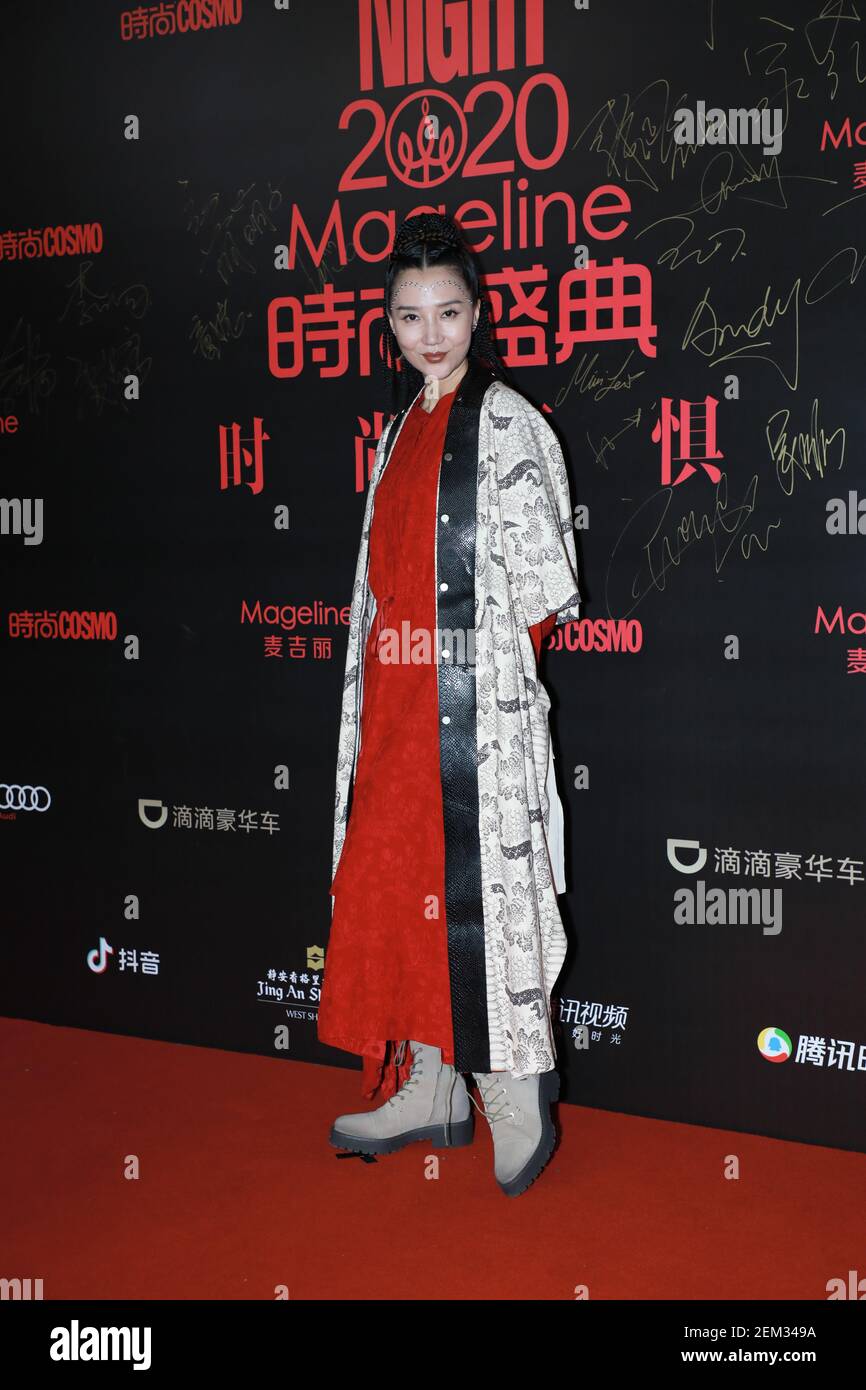Chinese singer Aduo attends the Cosmo fashion event in Shanghai, China ...