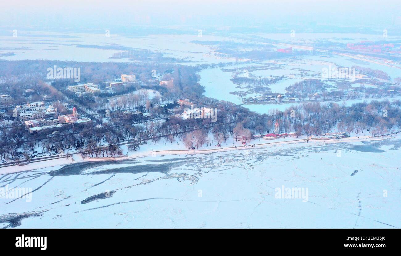 --FILE--An aerial view of the frozen Songhua River covered by snow ...