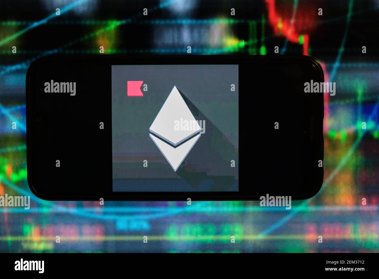 In this photo illustration an Etherium logo is displayed on a ...