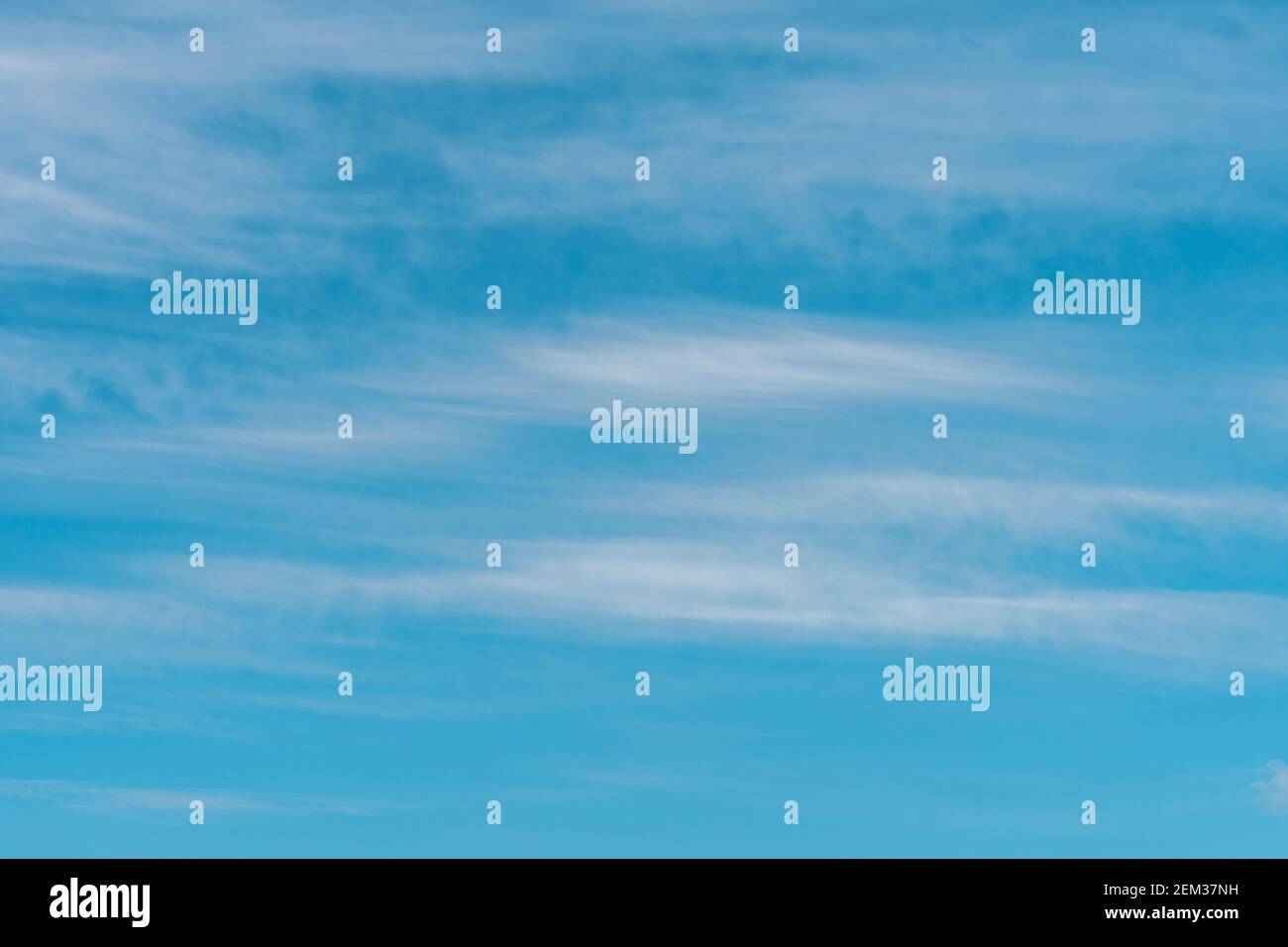 Blue sky background with clouds. Nature backdrop Stock Photo - Alamy